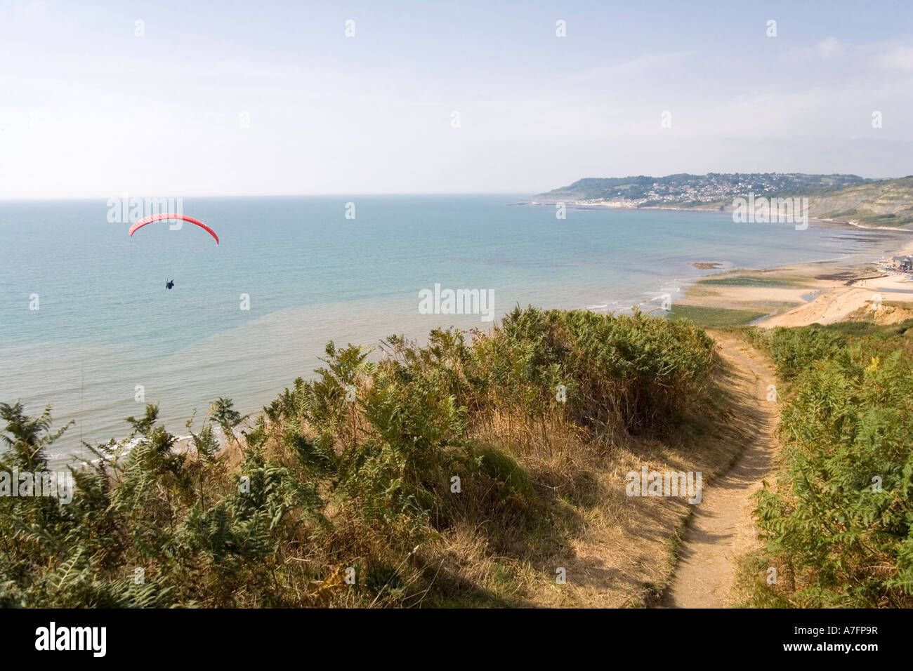 hanglider charmouth cliffs dorset Stock Photo - Alamy