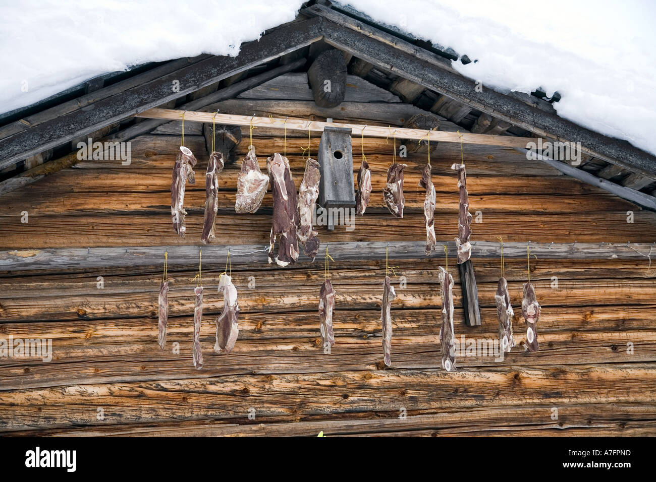 Reindeer Meat drying in the cold Stock Photo - Alamy