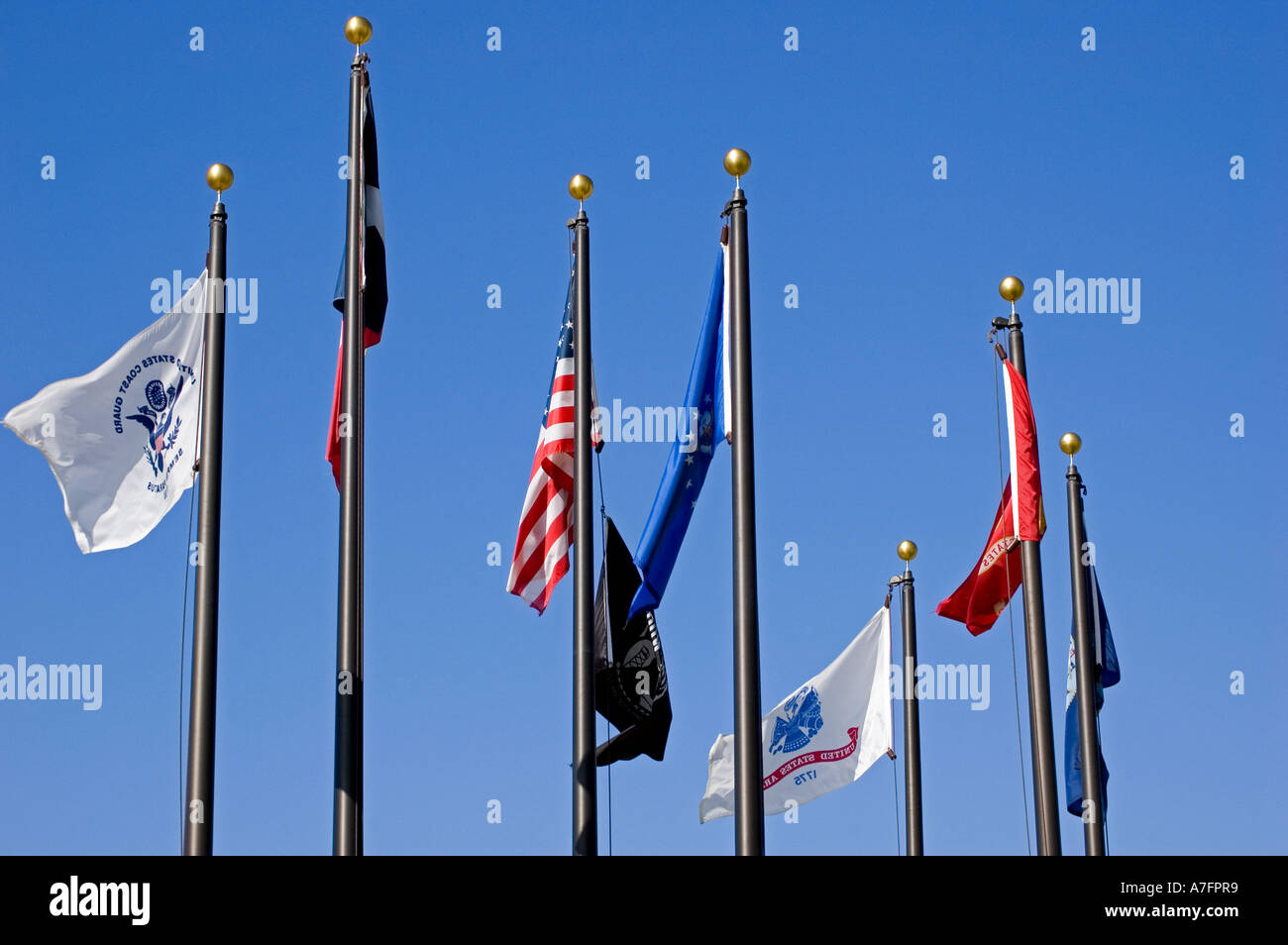 Flags on flag poles Stock Photo - Alamy