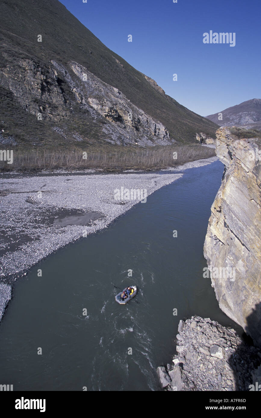 USA, Alaska, Arctic National Wildlife Refuge. Rafting by cliffs of ...