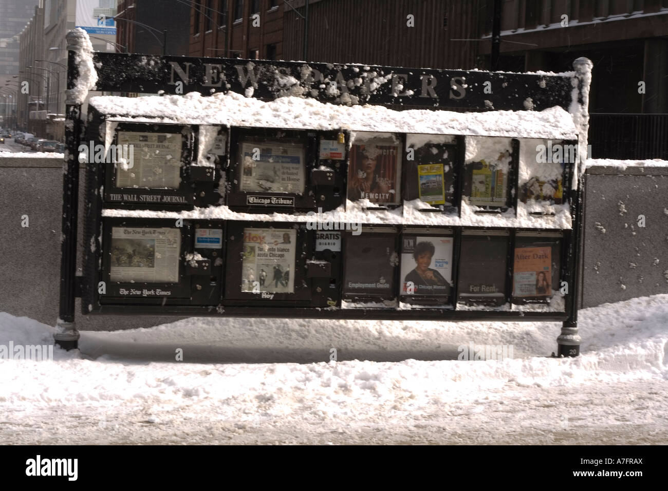 Newspaper boxes covered with snow Stock Photo - Alamy