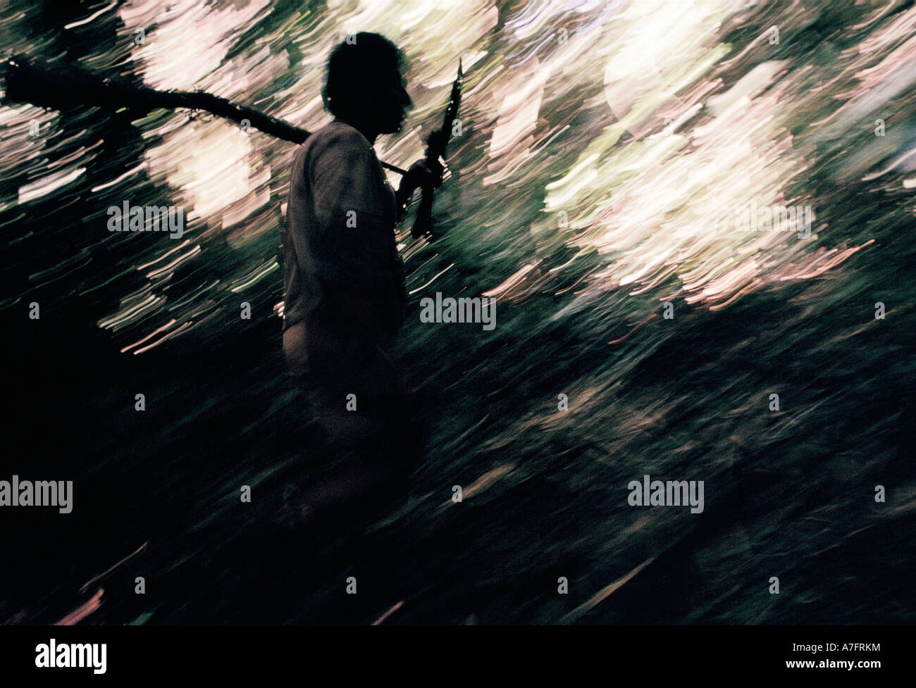 Chief Ira hunting in the forest with shotgun and machete Stock Photo ...