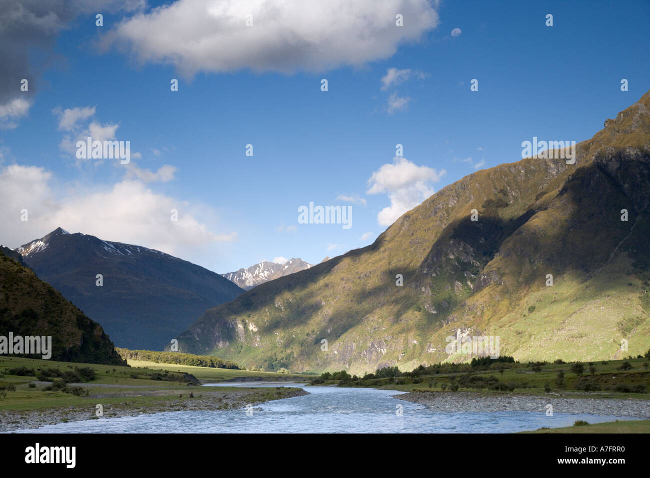 Moonrise over river valley Stock Photo - Alamy