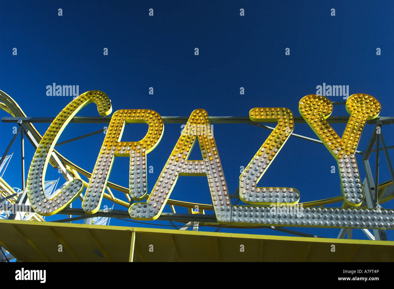 CRAZY sign on rollercoaster ride on end of Brighton or Palace Pier ...