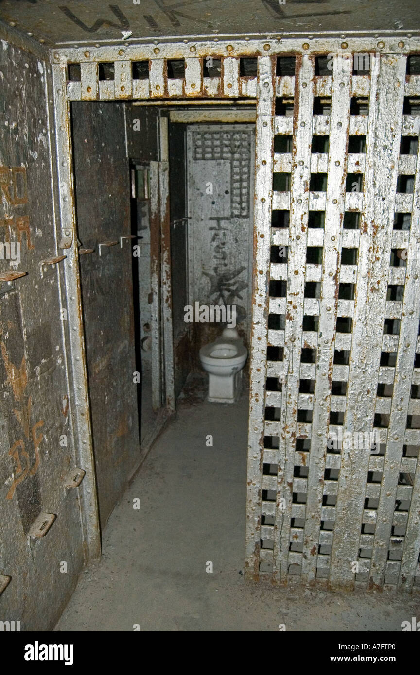Iron wall in old jail Stock Photo - Alamy