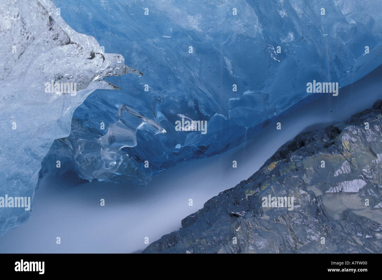 U.S.A., Alaska, Kenai Fjords National Park Melting water carves blue ...