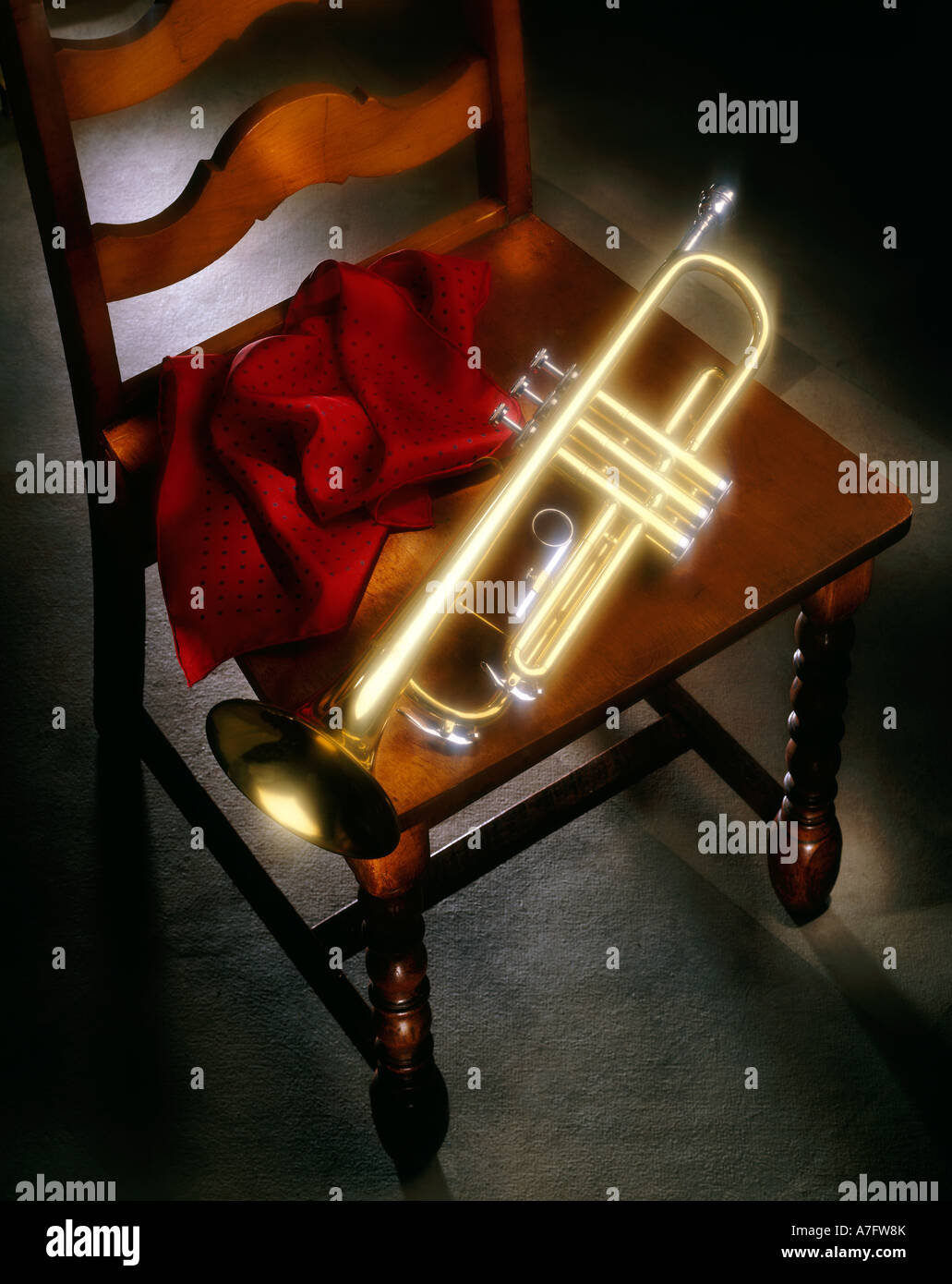Trumpet on chair vertical Stock Photo - Alamy