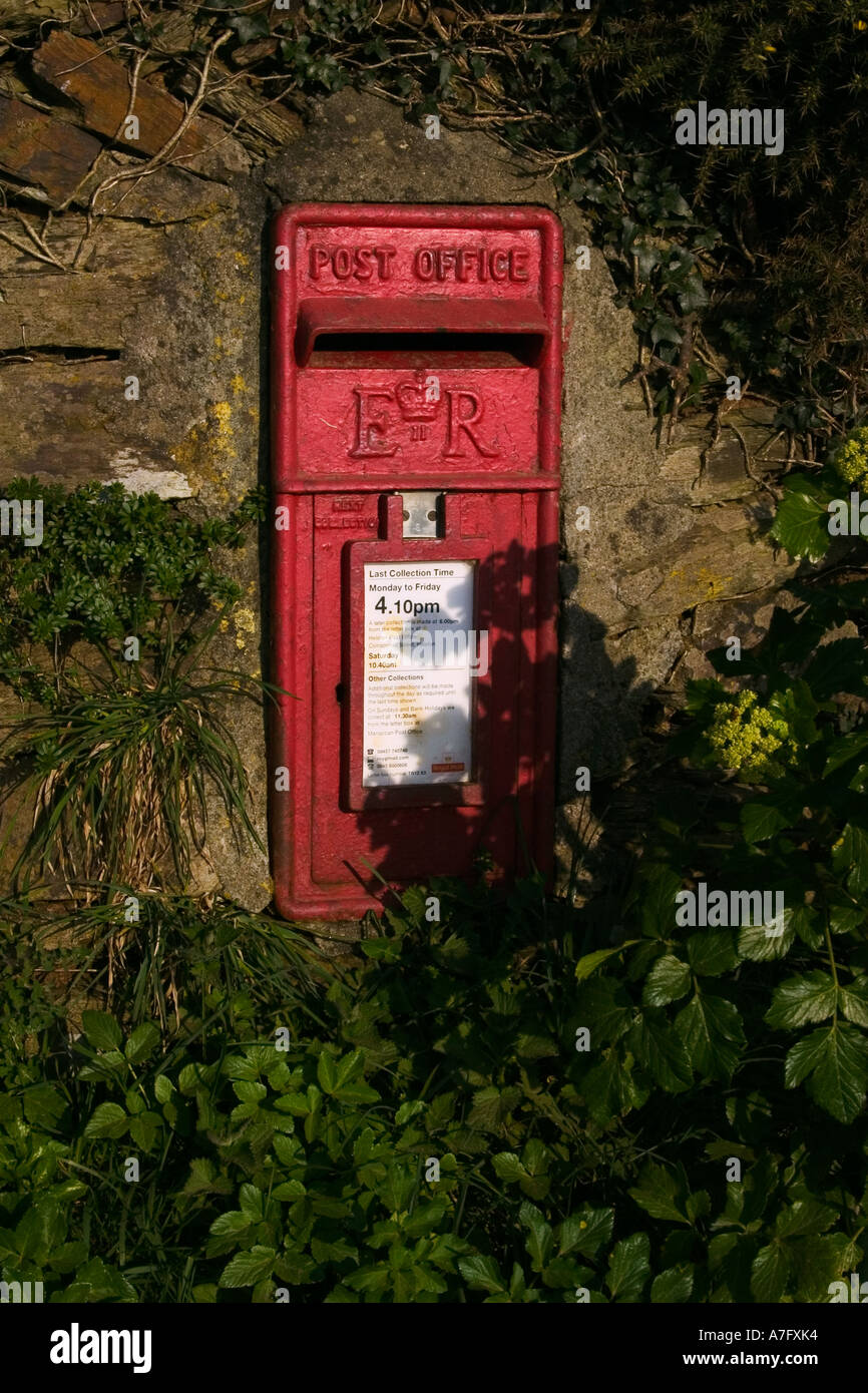 Portrait shot of EIIR red letterbox mounted in brick wall Stock Photo ...