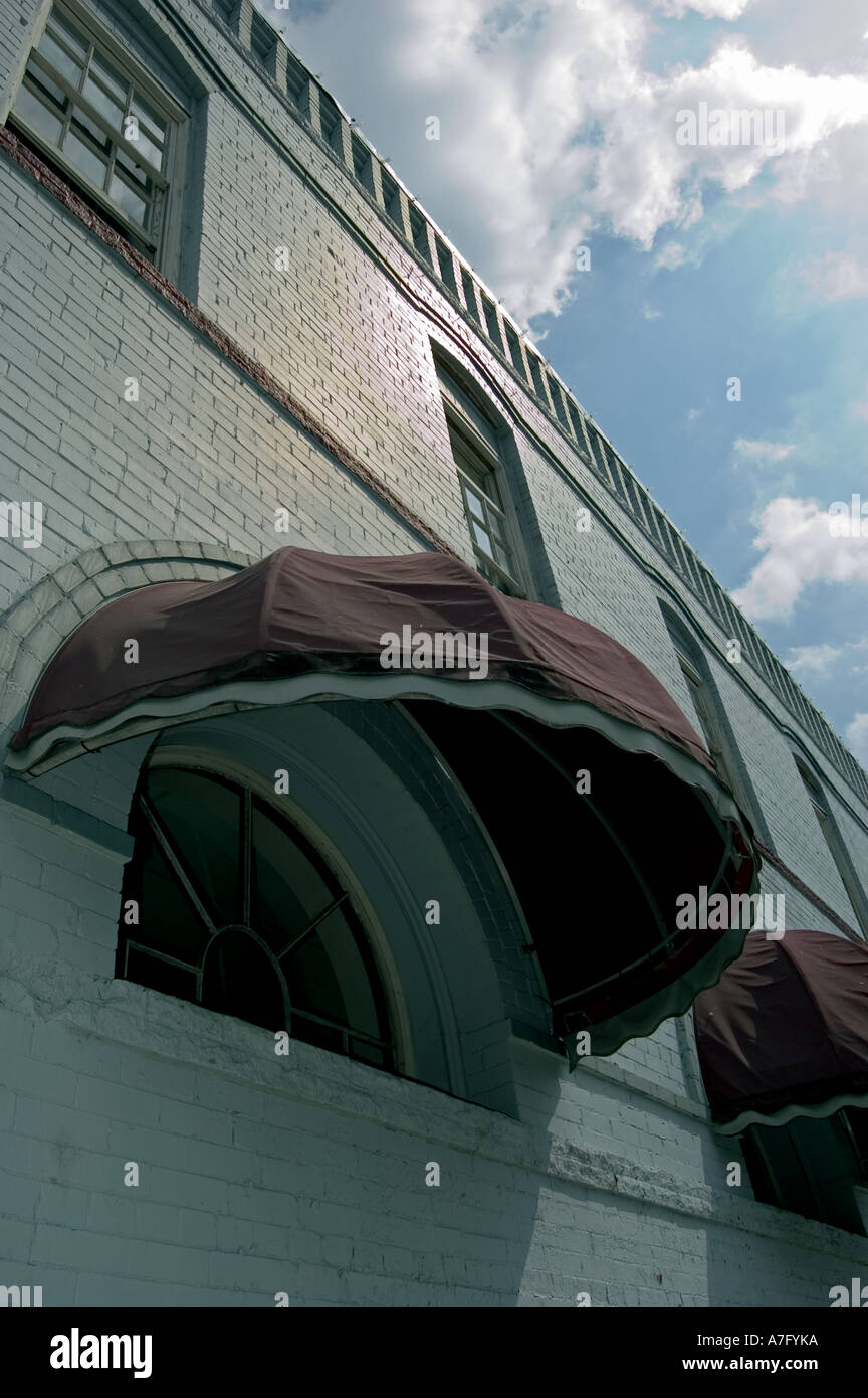 Canvas window covers of office building Stock Photo - Alamy
