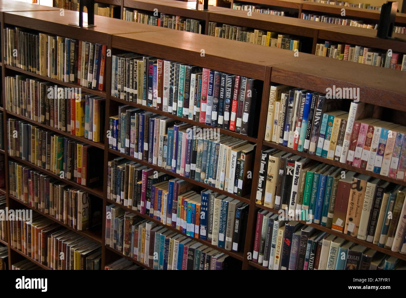 Public library shelves full of books Stock Photo - Alamy