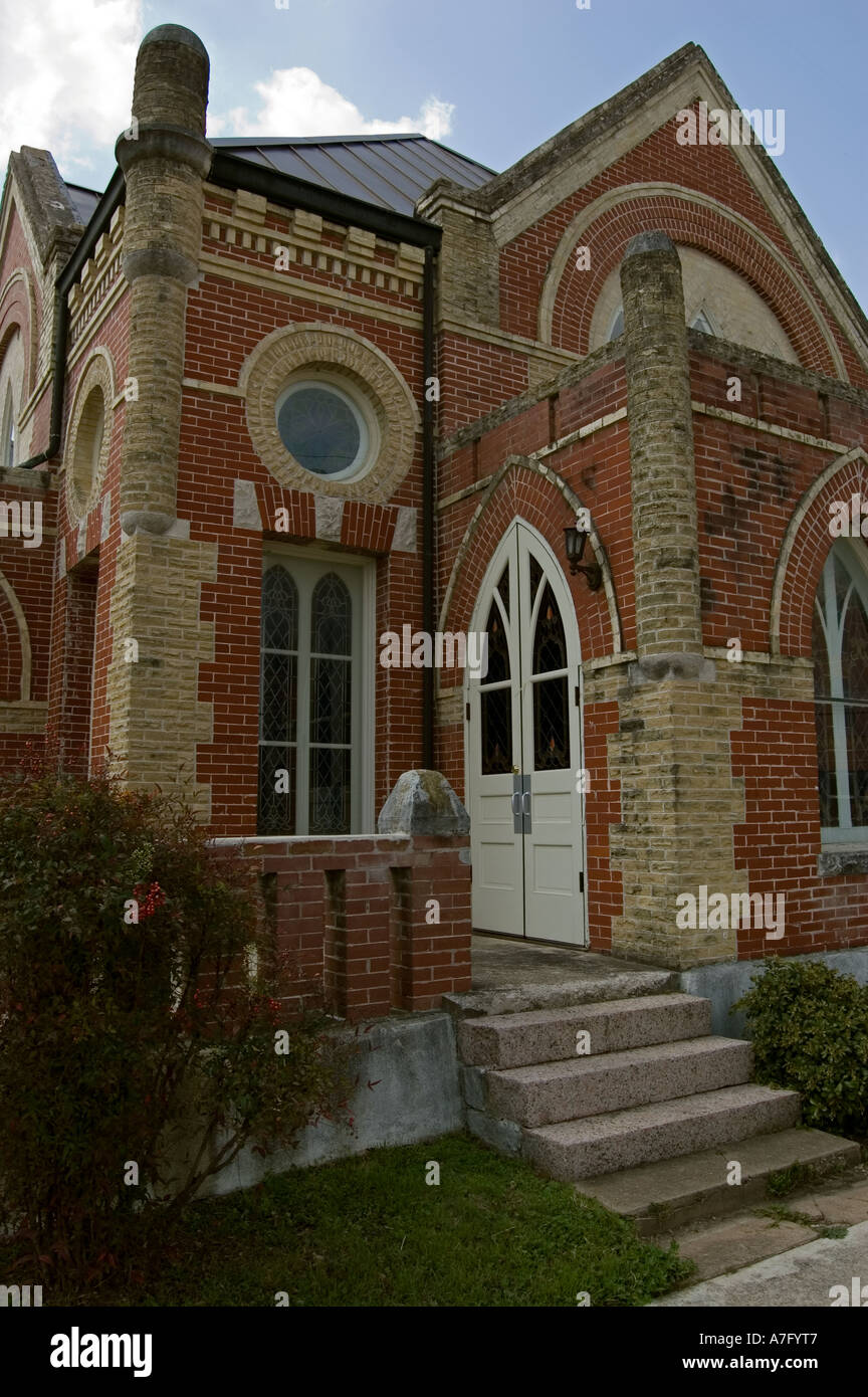 Church entrance with arched windows and interesting brick masonry work ...