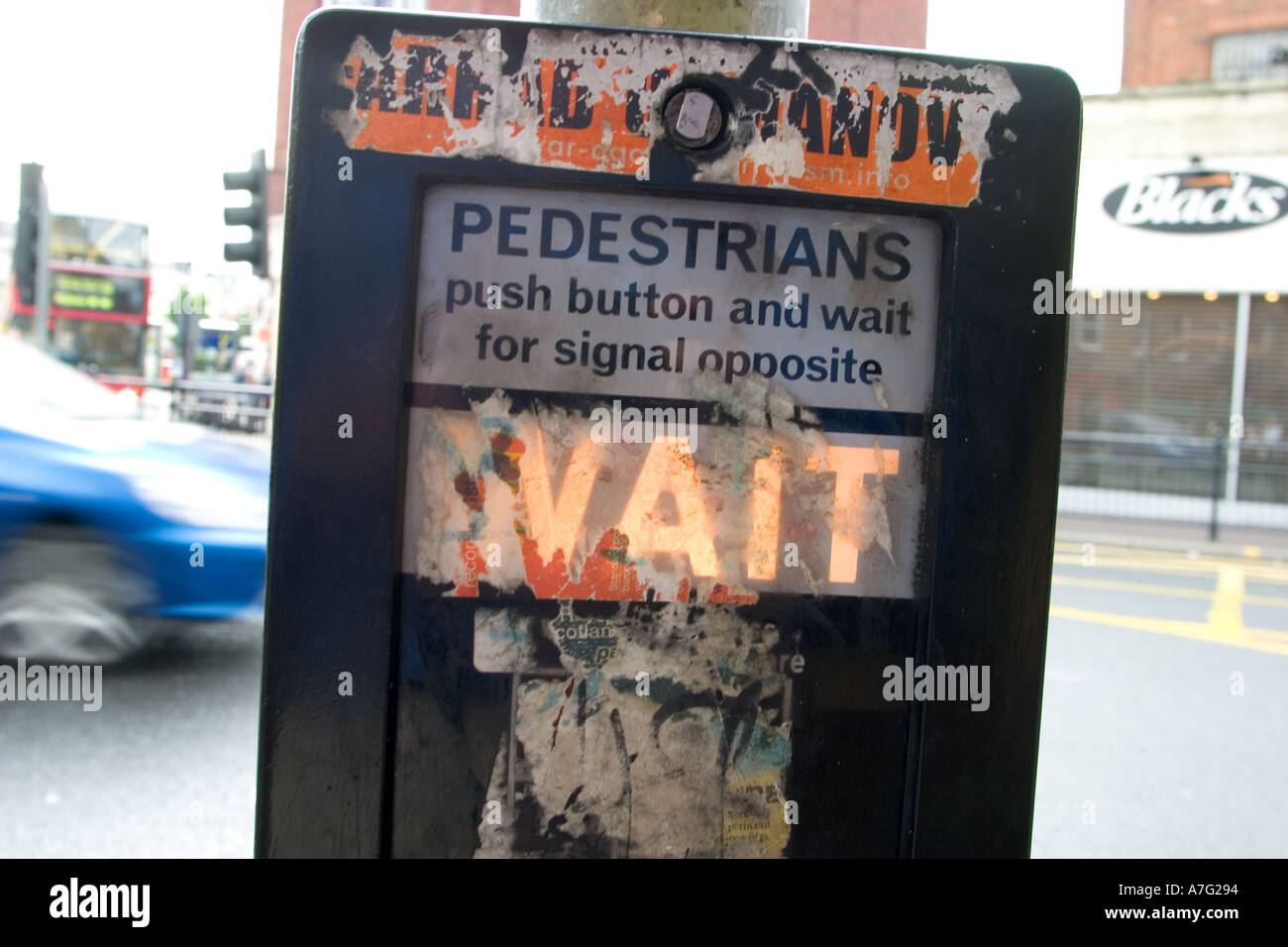 Pedestrian Crossing WAIT sign illuminated Stock Photo - Alamy