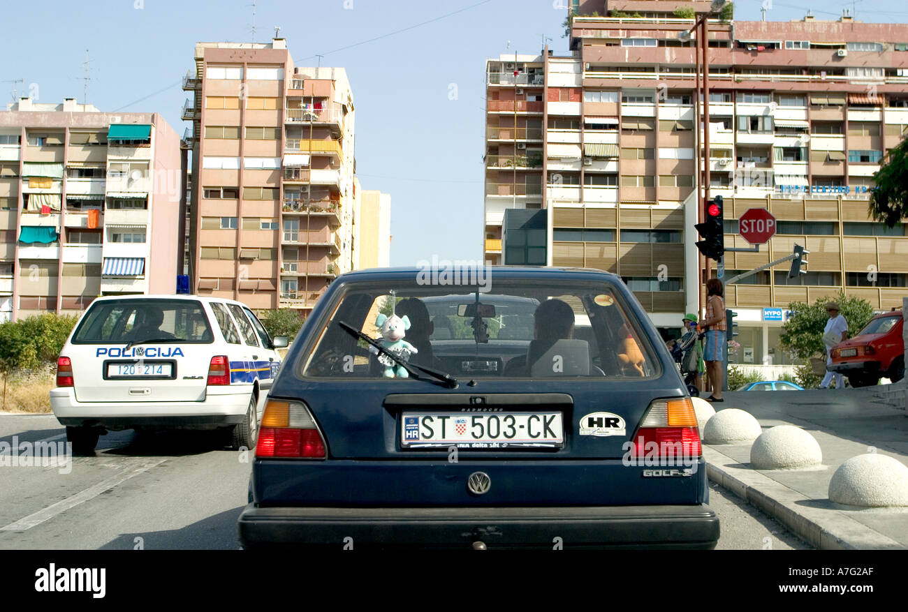 Police car and other cars waiting at traffic lights in Split Croatia ...