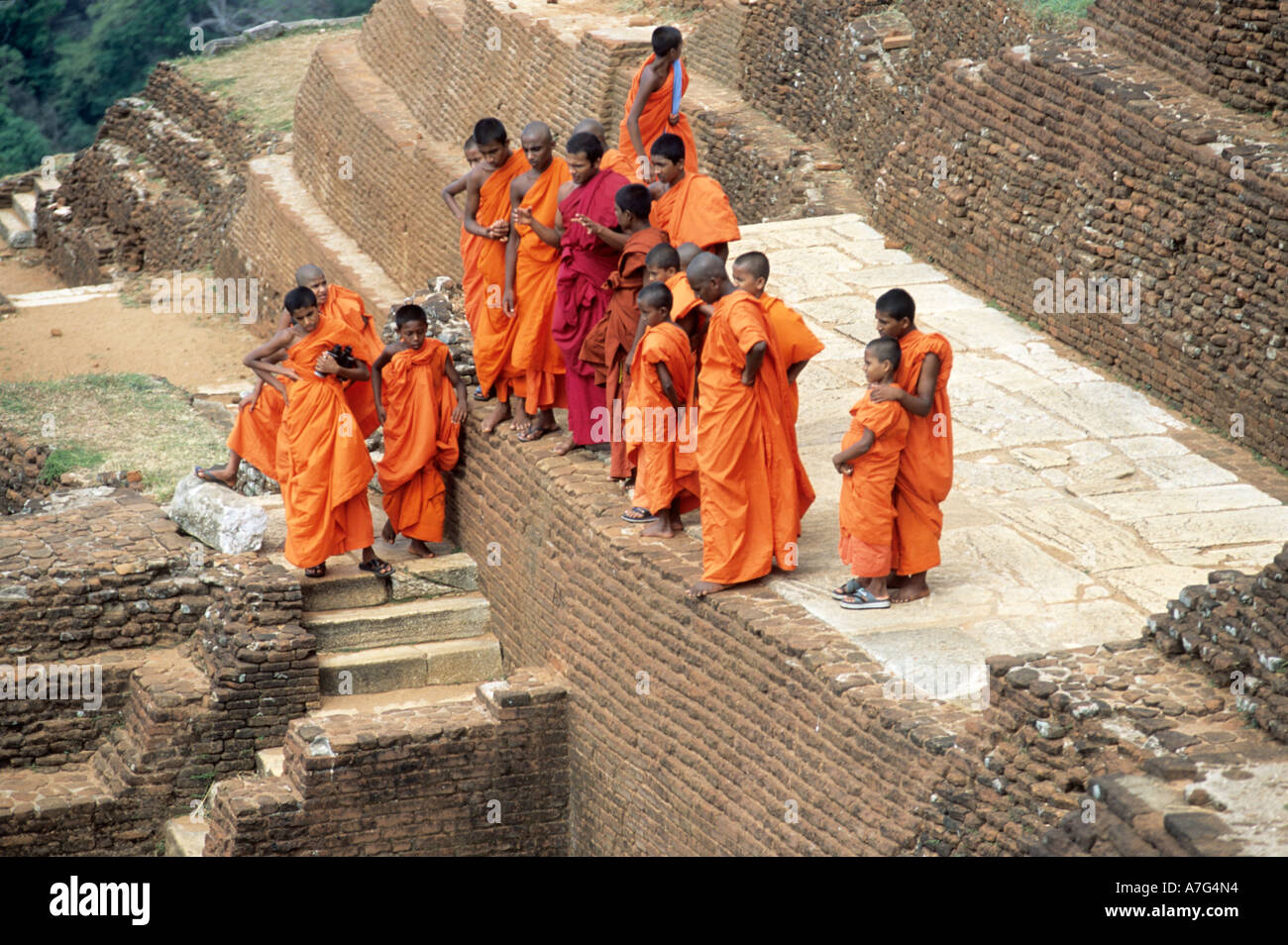 Buddhist monks visit the summit of Sigiriya - the Lion Rock - Sri Lanka ...