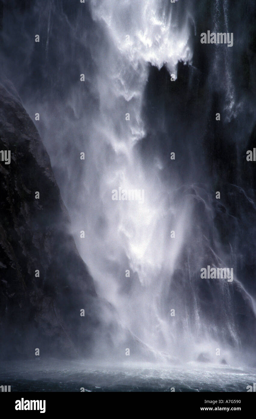 waterfall at milford sound new zealand Stock Photo - Alamy
