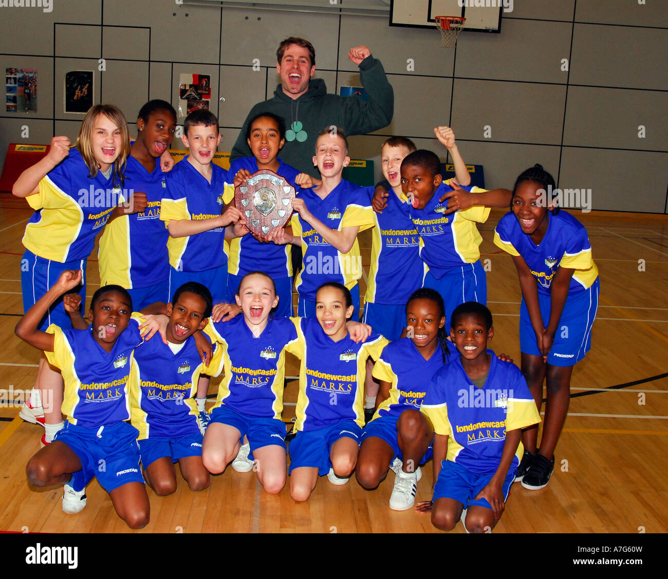 Team photo of winning school sports team following an inter school ...