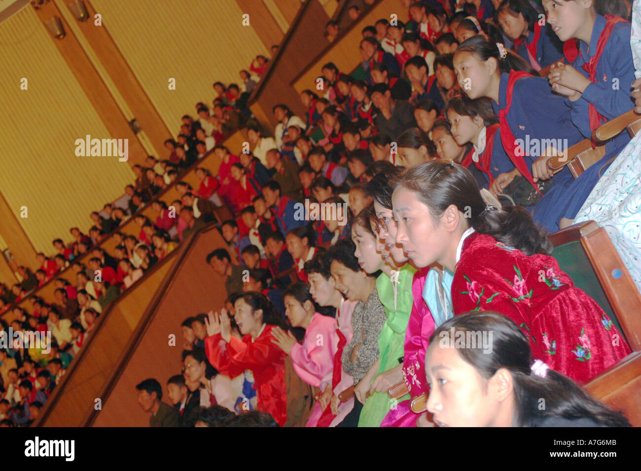 North Koreans sit in the audience and watch the Circus in Pyongyang ...