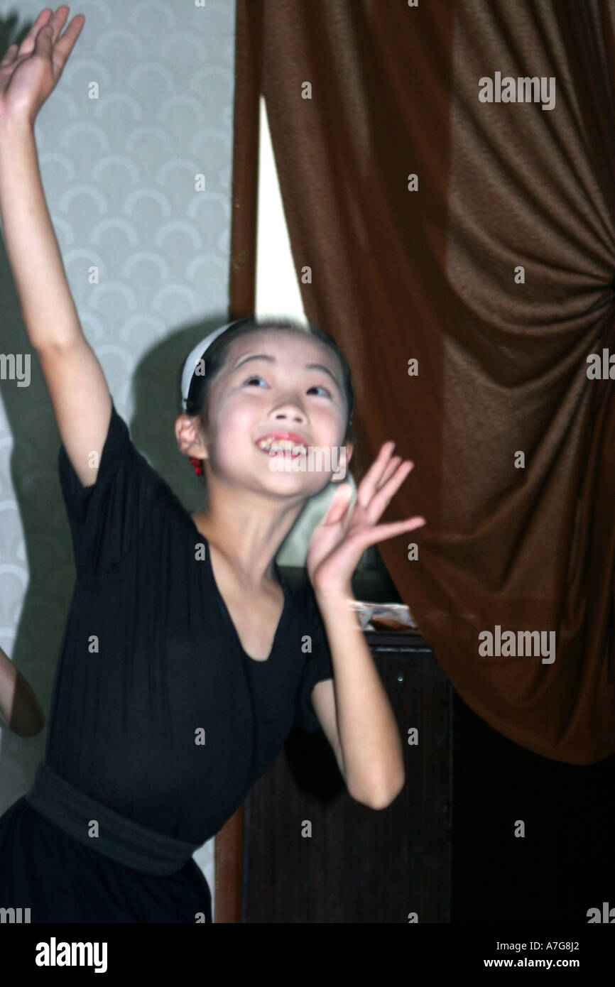 A young North Korean girl showing her dancing at the Children's Palace ...