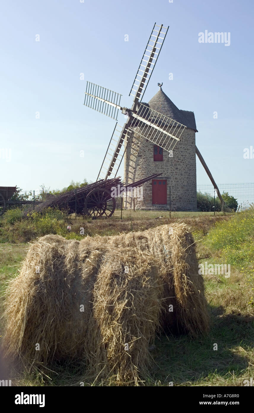 HAY BALE AND ANCIENT WINDMILL BRITTANY FRANCE Stock Photo - Alamy