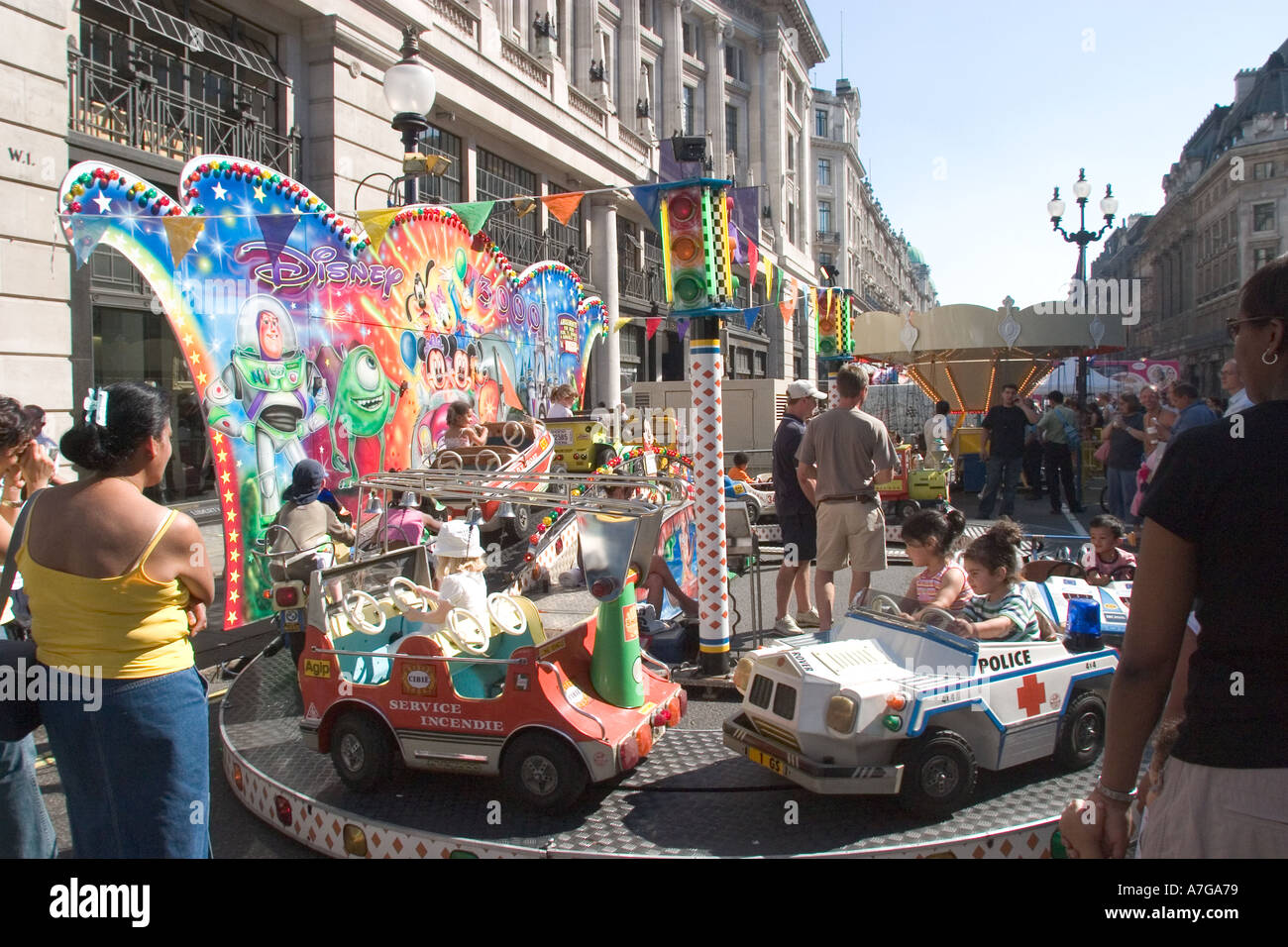 Childrens roundabout in Regent Street during Regent Street ...