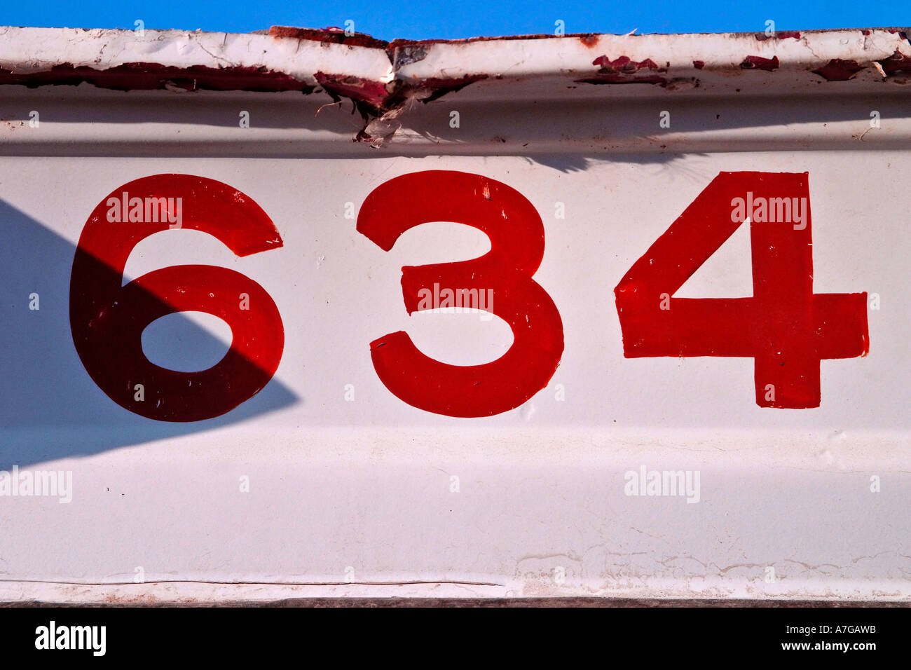 Numbered rust vehicle Stock Photo - Alamy