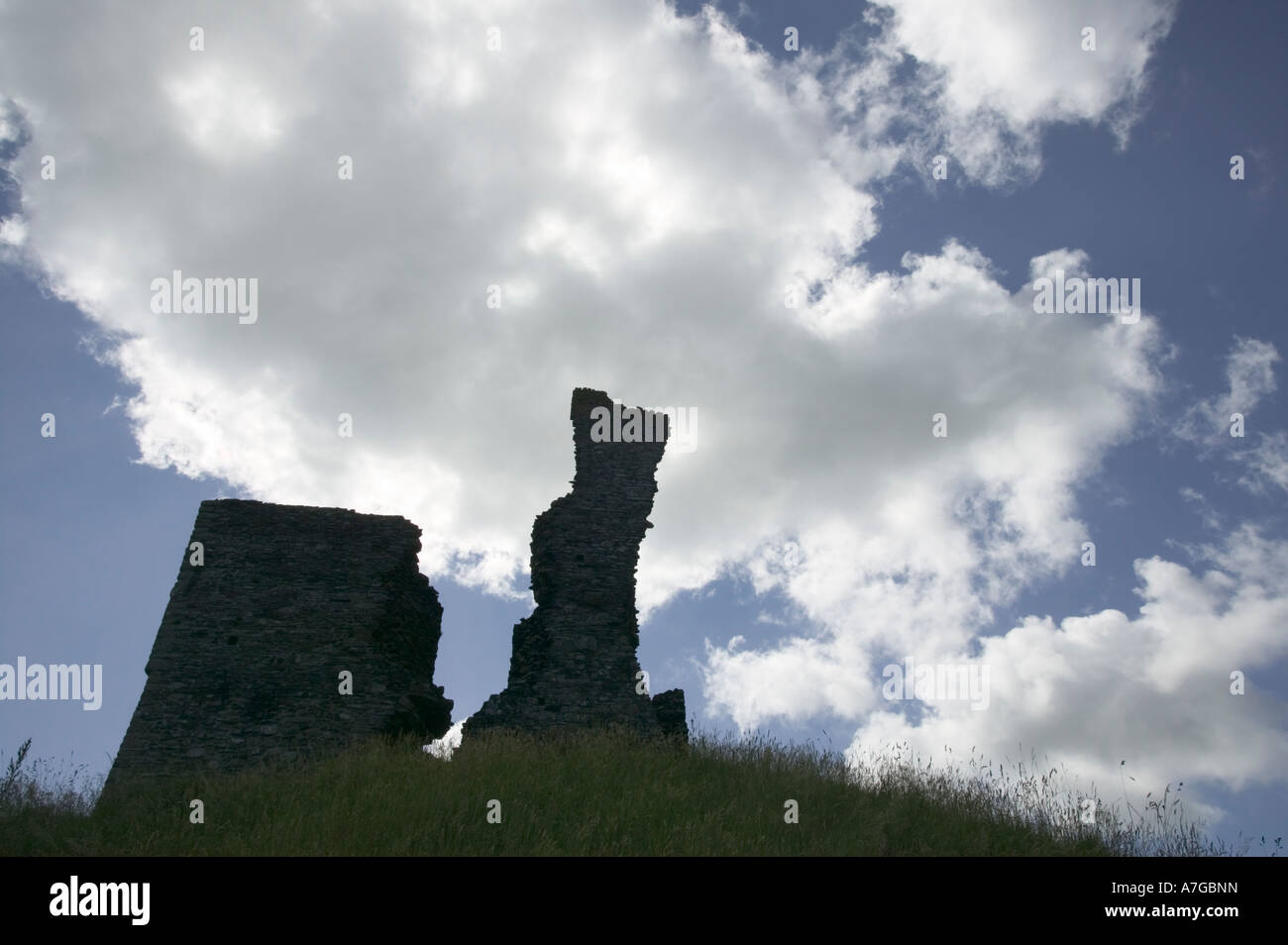 The silhouetted ruins of the castle keep Okehampton Castle Okehampton ...