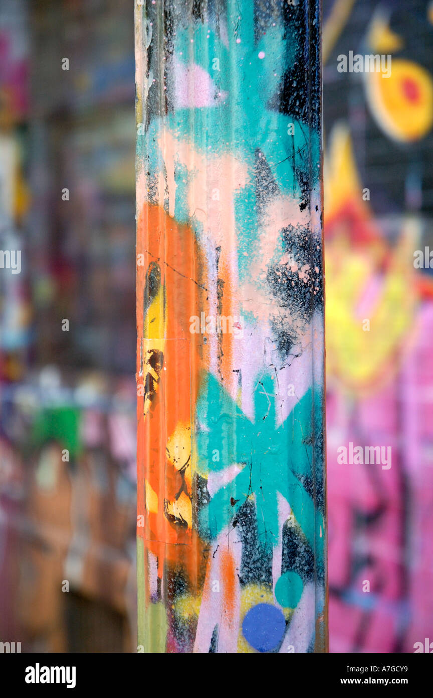 Graffiti on a lamp post and wall, Brighton, England Stock Photo - Alamy