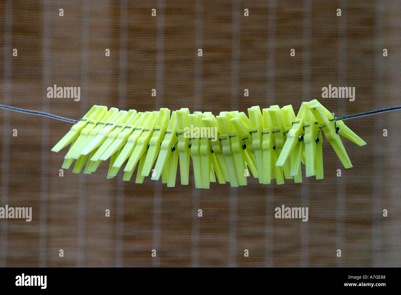 Pegs on a washing line Stock Photo - Alamy