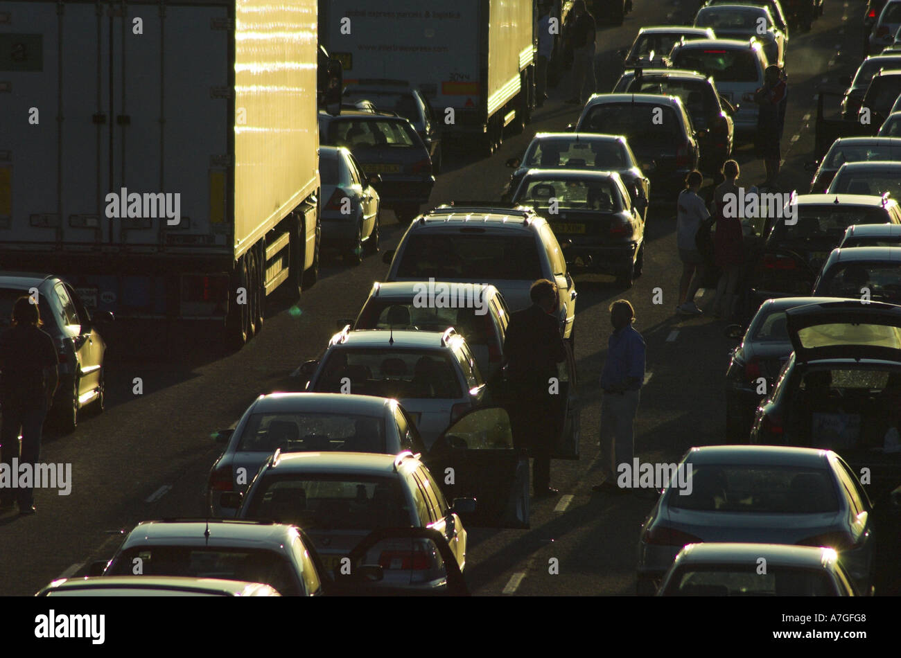 The sun sets over a traffic jam Congestion pollution climate change ...