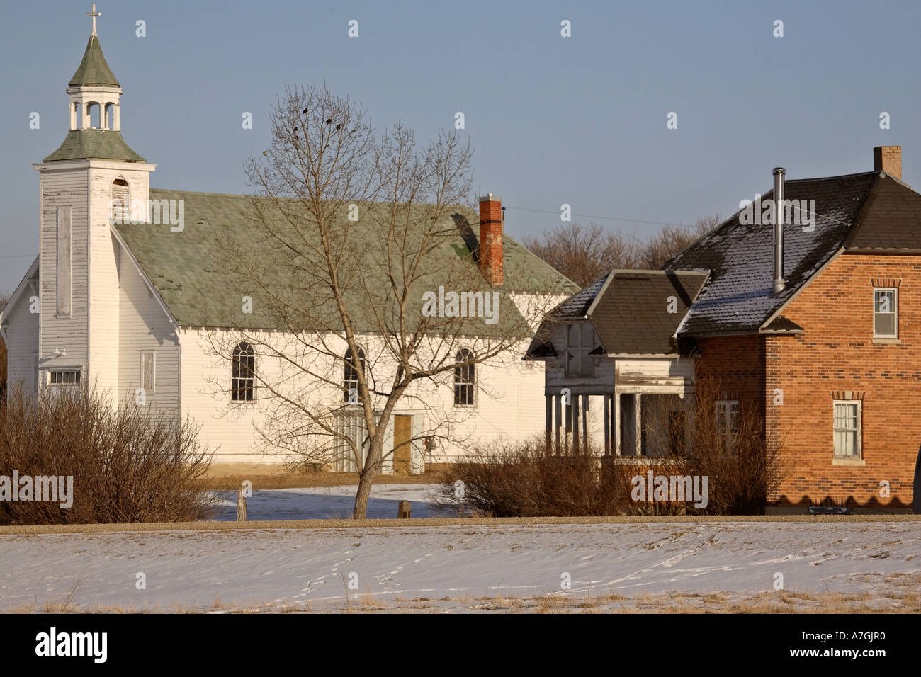 The old church and brick house in Spring Valley in scenic Saskatchewan ...