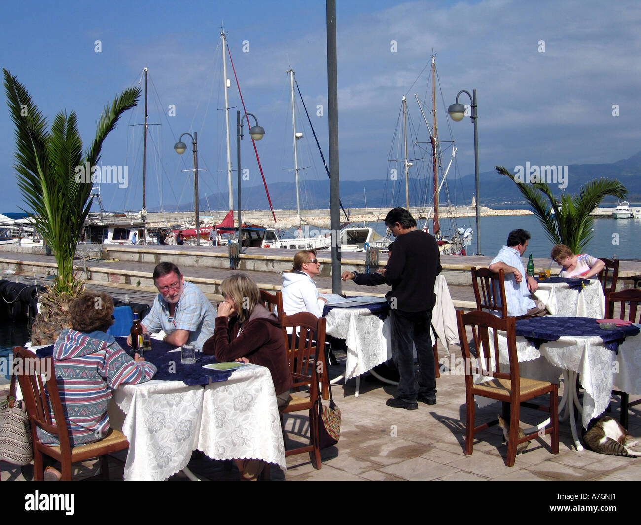 Tourists in the Sunshine Enjoying a Seafood Restaurant in Resort ...