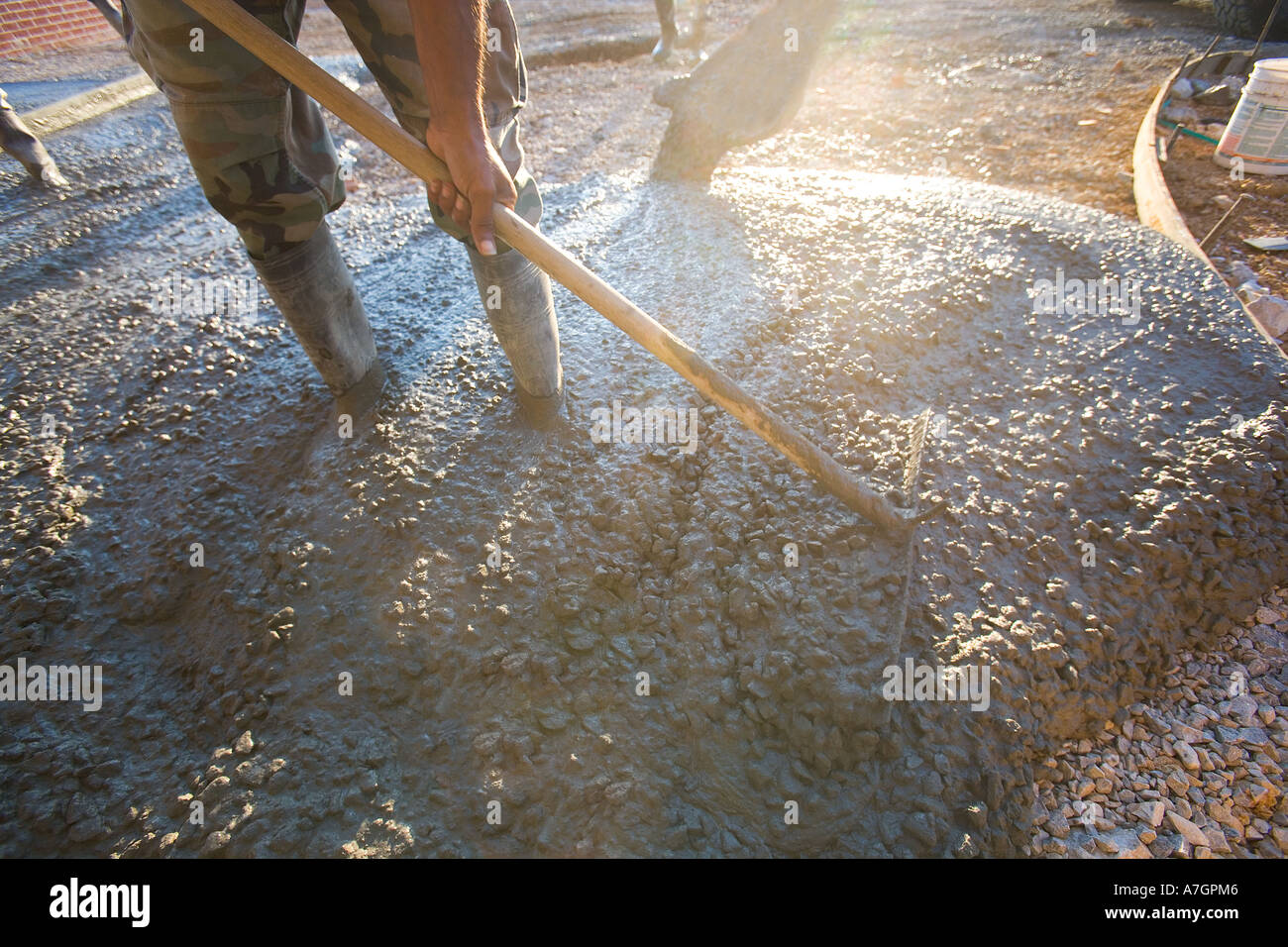 Smoothing wet cement Stock Photo - Alamy