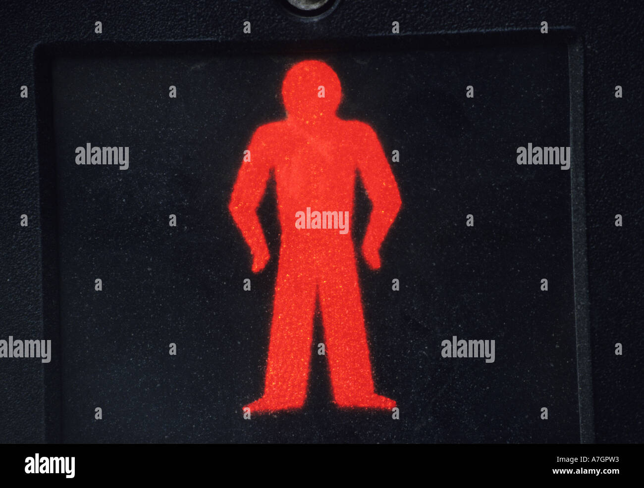 red stop warning light shining on pedestrian crossing by the roadside ...