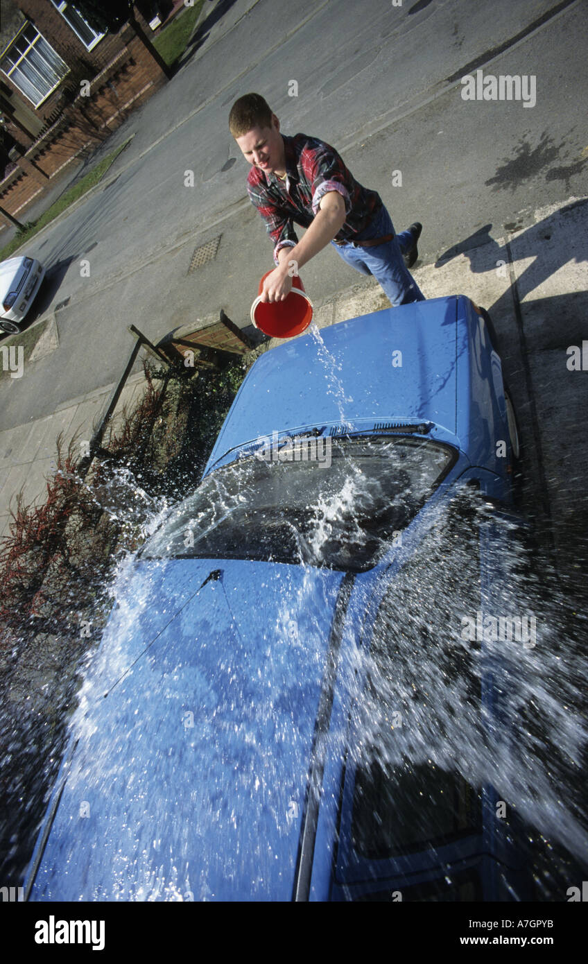Teenager washing car hi-res stock photography and images - Alamy