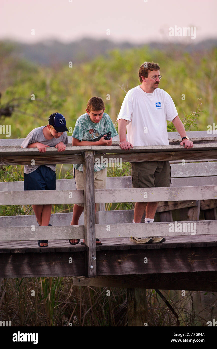 Family on boardwalk enjoying the Everglades, Taylor Slough, Everglades ...