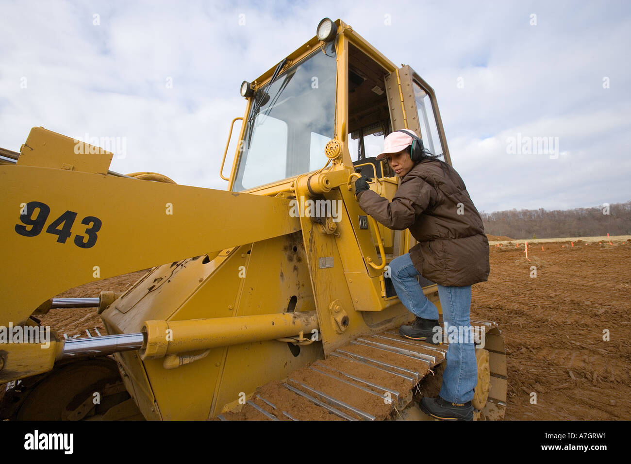 Female bulldozer operator Stock Photo - Alamy