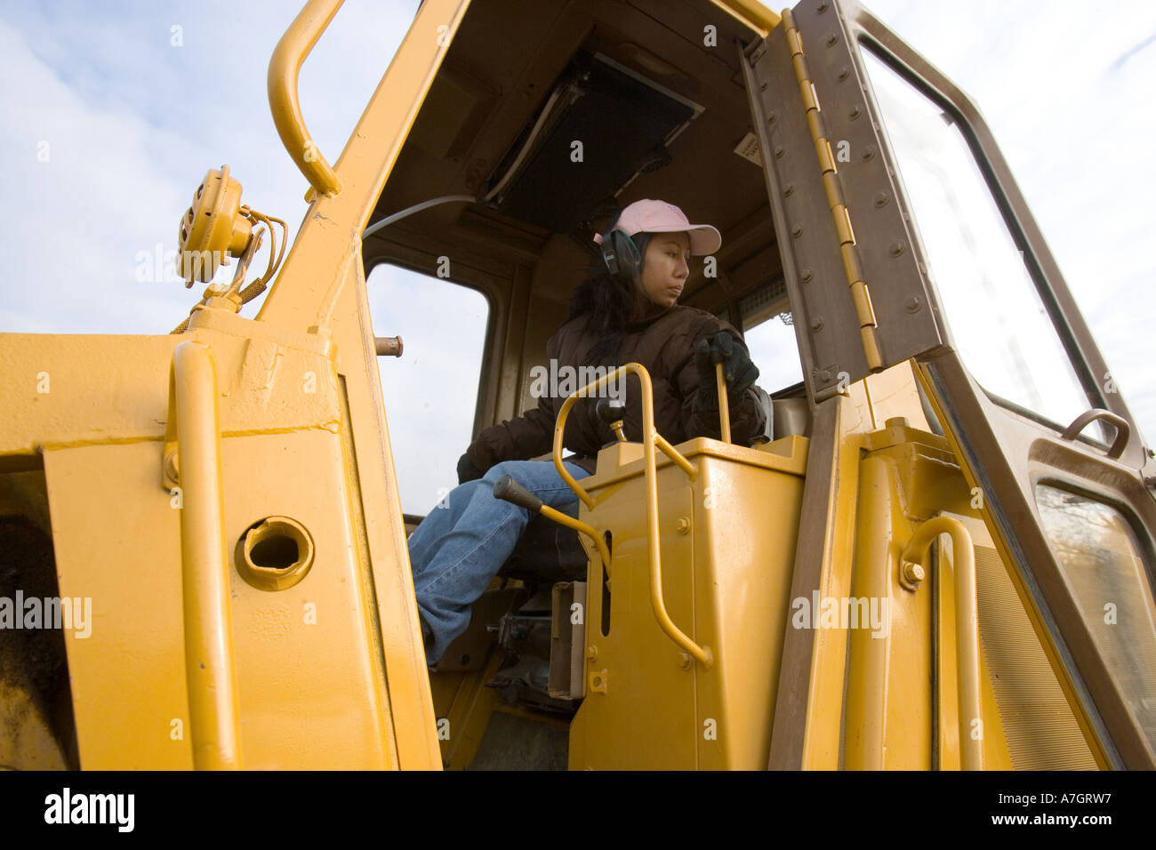 Female bulldozer operator Stock Photo - Alamy