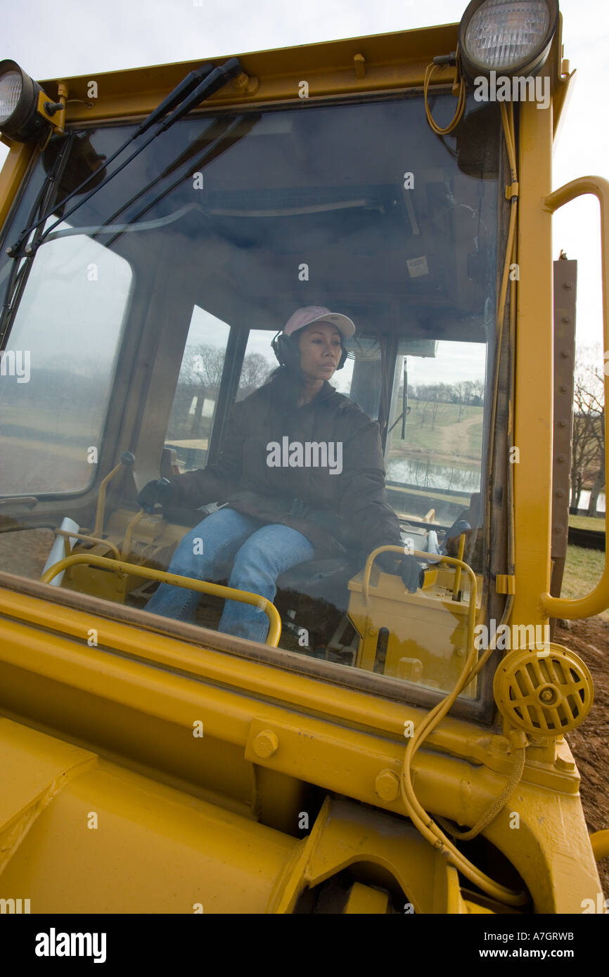 Female bulldozer operator Stock Photo - Alamy