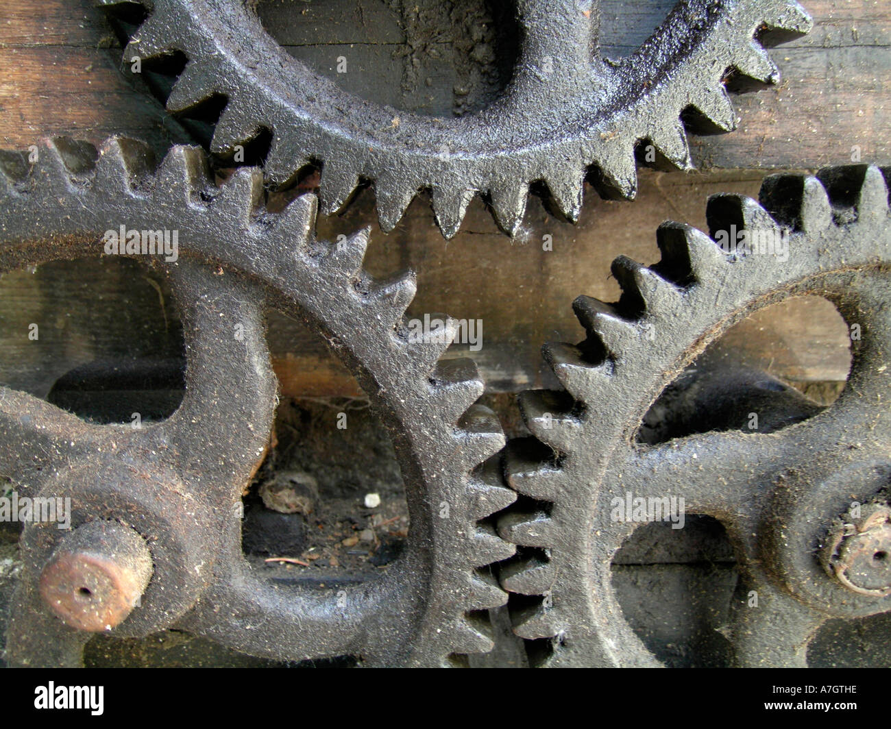 three old gearwheels cogwheels rack wheels Stock Photo - Alamy