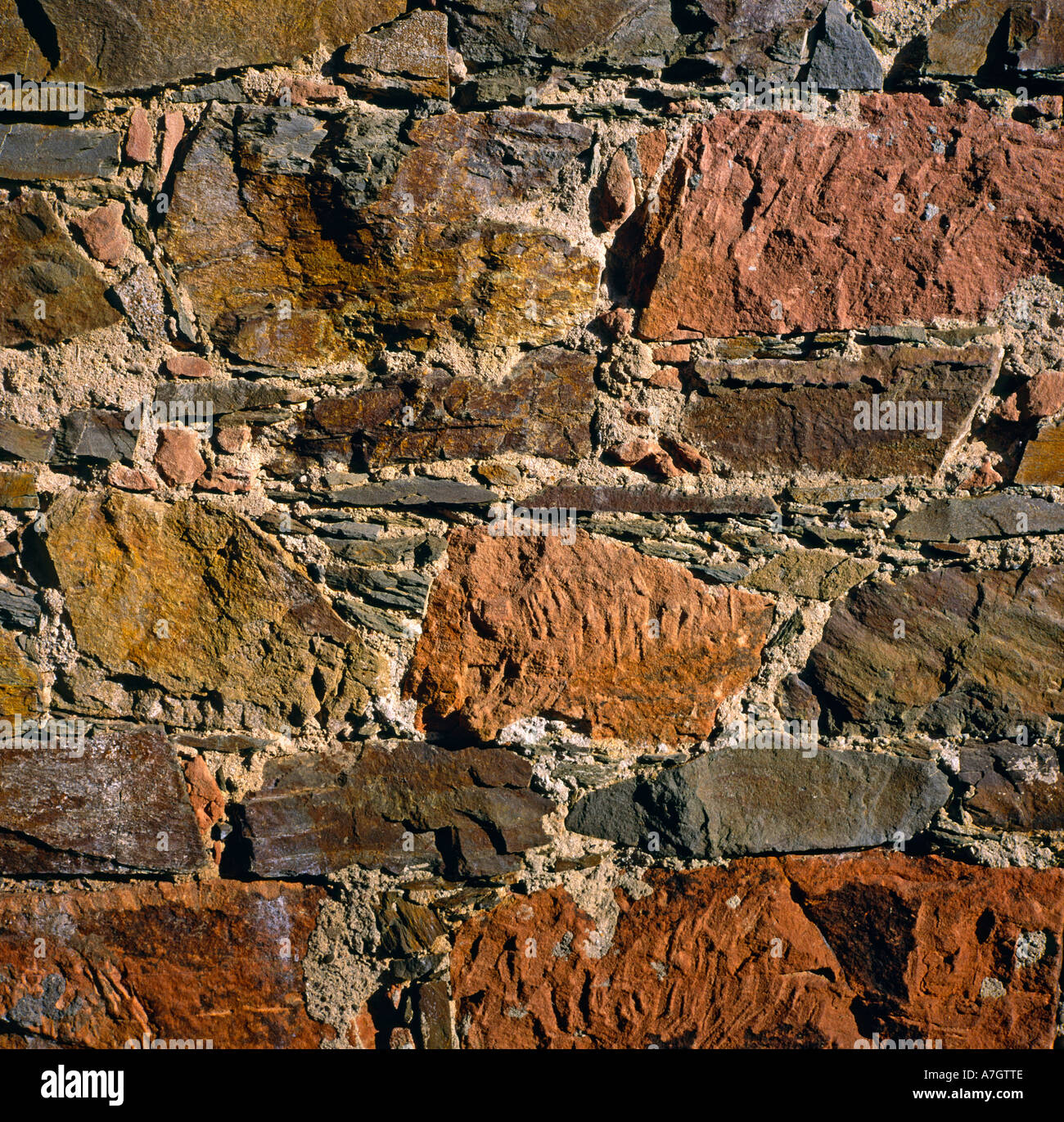 wall made of sandstone and basalt Stock Photo - Alamy