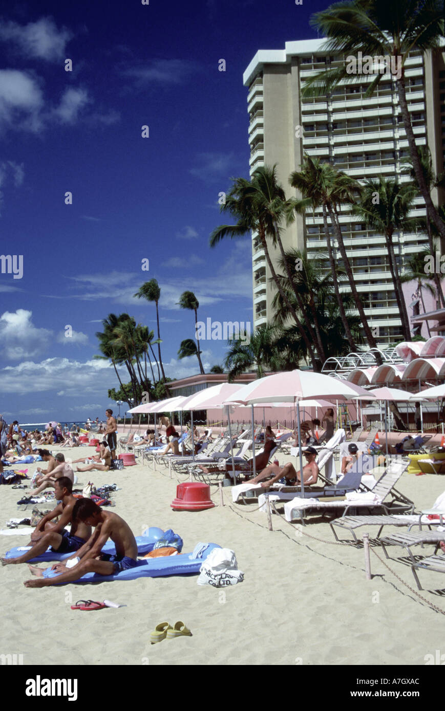 Sunbathing on beach waikiki beach hi-res stock photography and images ...