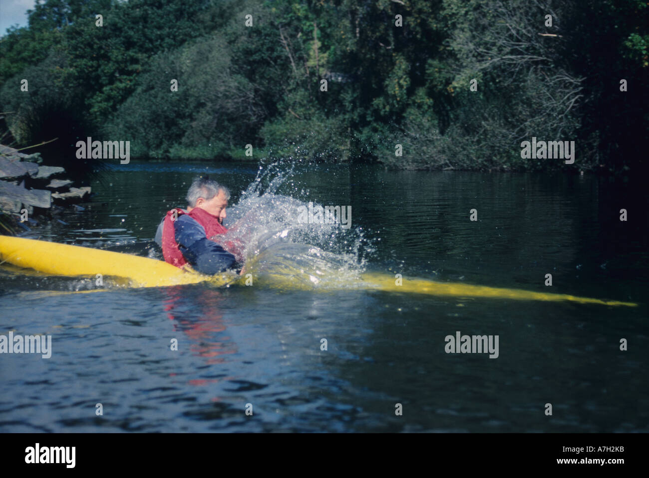 Man launching canoe water hi-res stock photography and images - Alamy