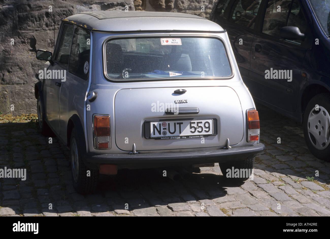 German car number plate spelling "Nut" on Mini Stock Photo - Alamy