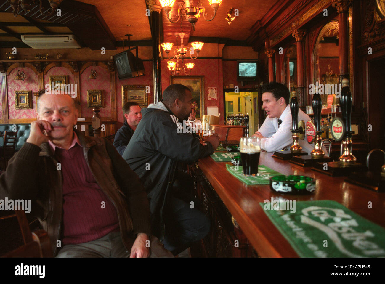 Older men in pub drinking hi-res stock photography and images - Alamy