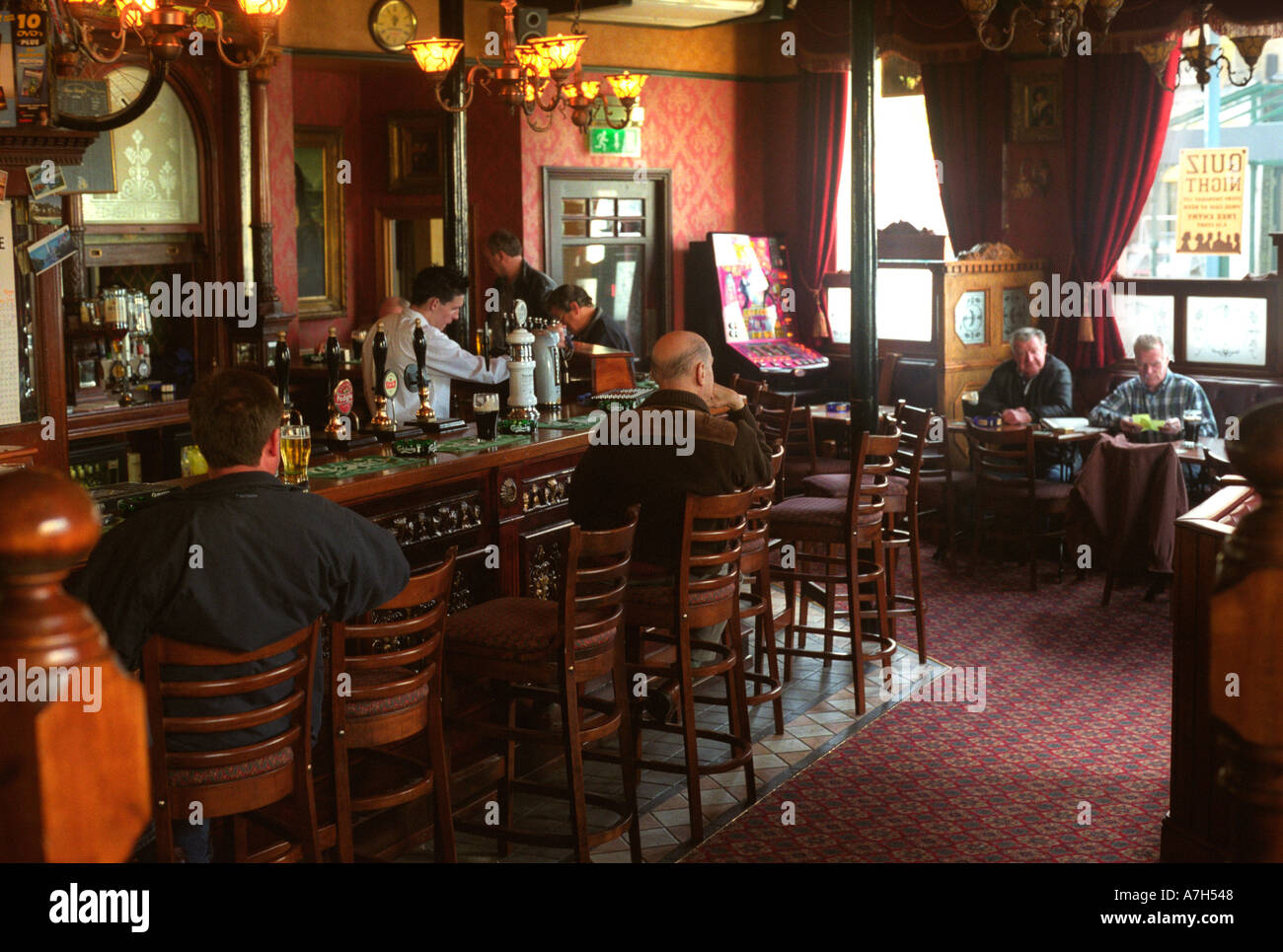 Old men drinking in pub hi-res stock photography and images - Alamy