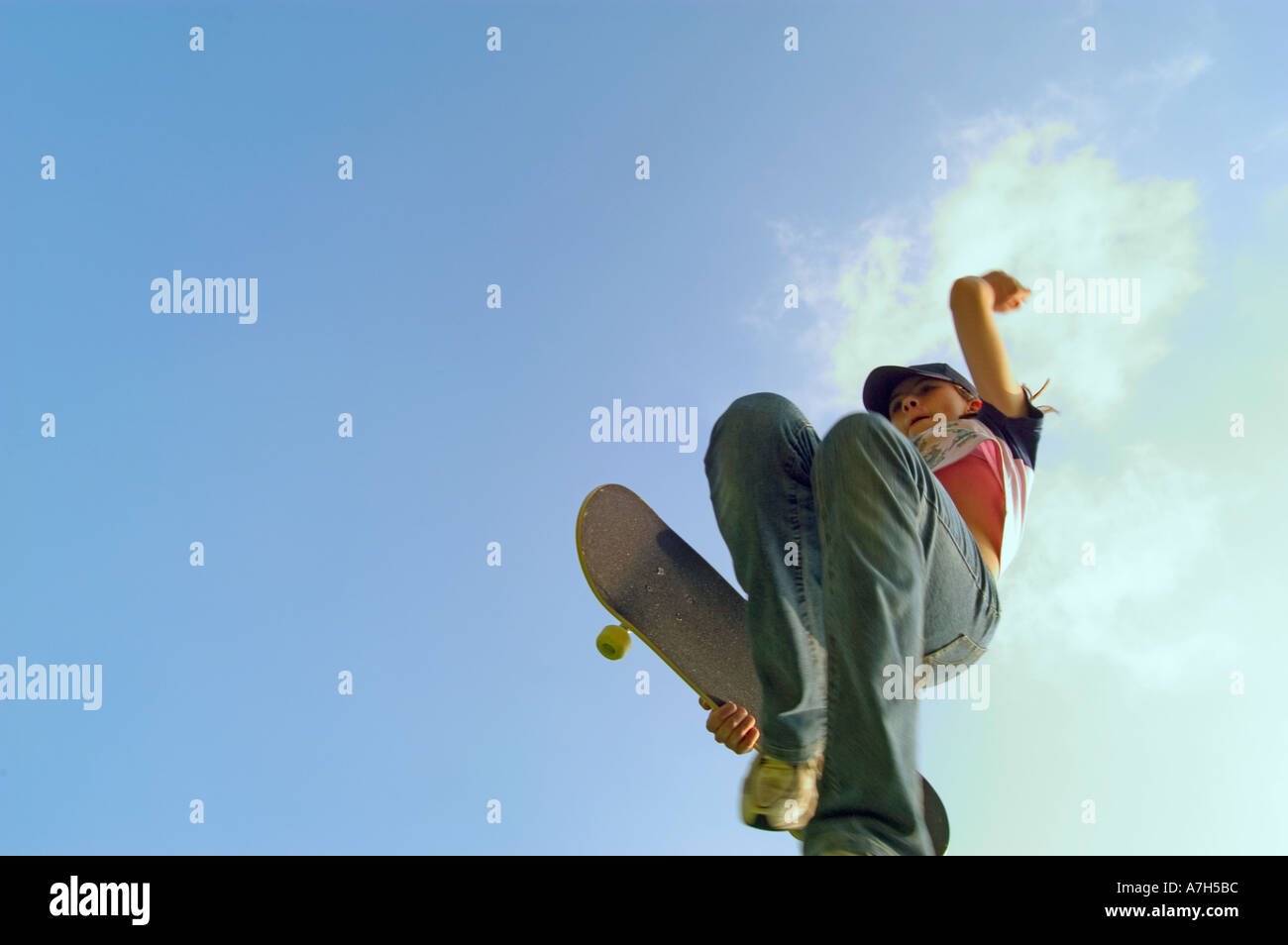 girl on skateboard jumping Stock Photo - Alamy