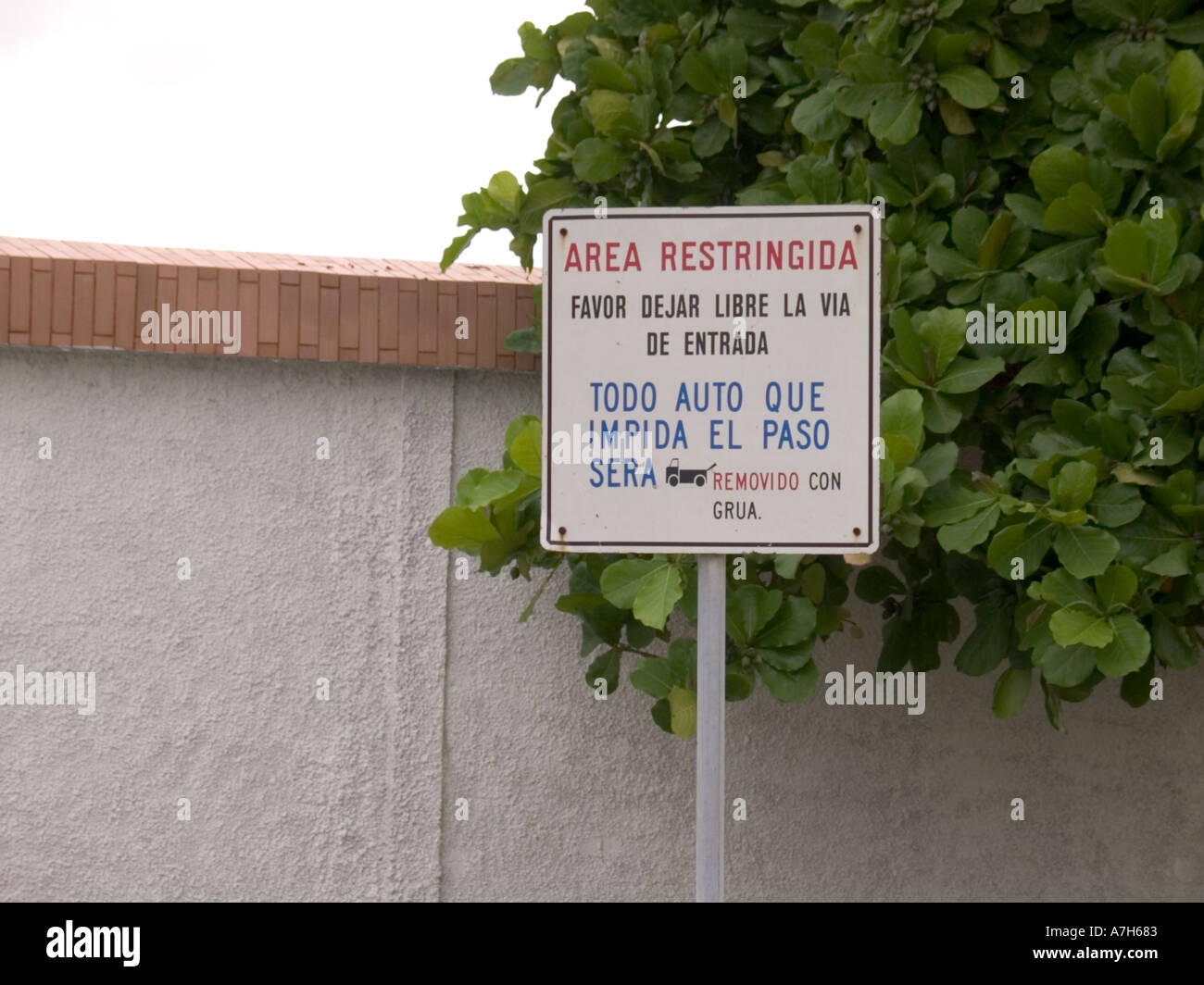 Spanish sign Restricted Area Stock Photo - Alamy