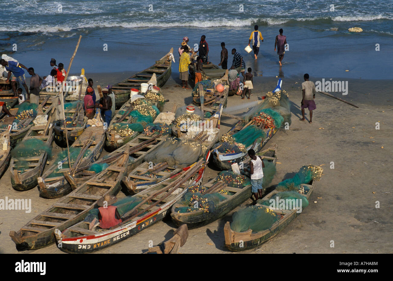 View of the beach and fishing pirogues from Cape Coast Castle, Ghana ...