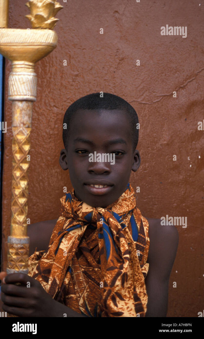Boy carrying a ceremonial staff at the Adae ceremony in honour of the ...