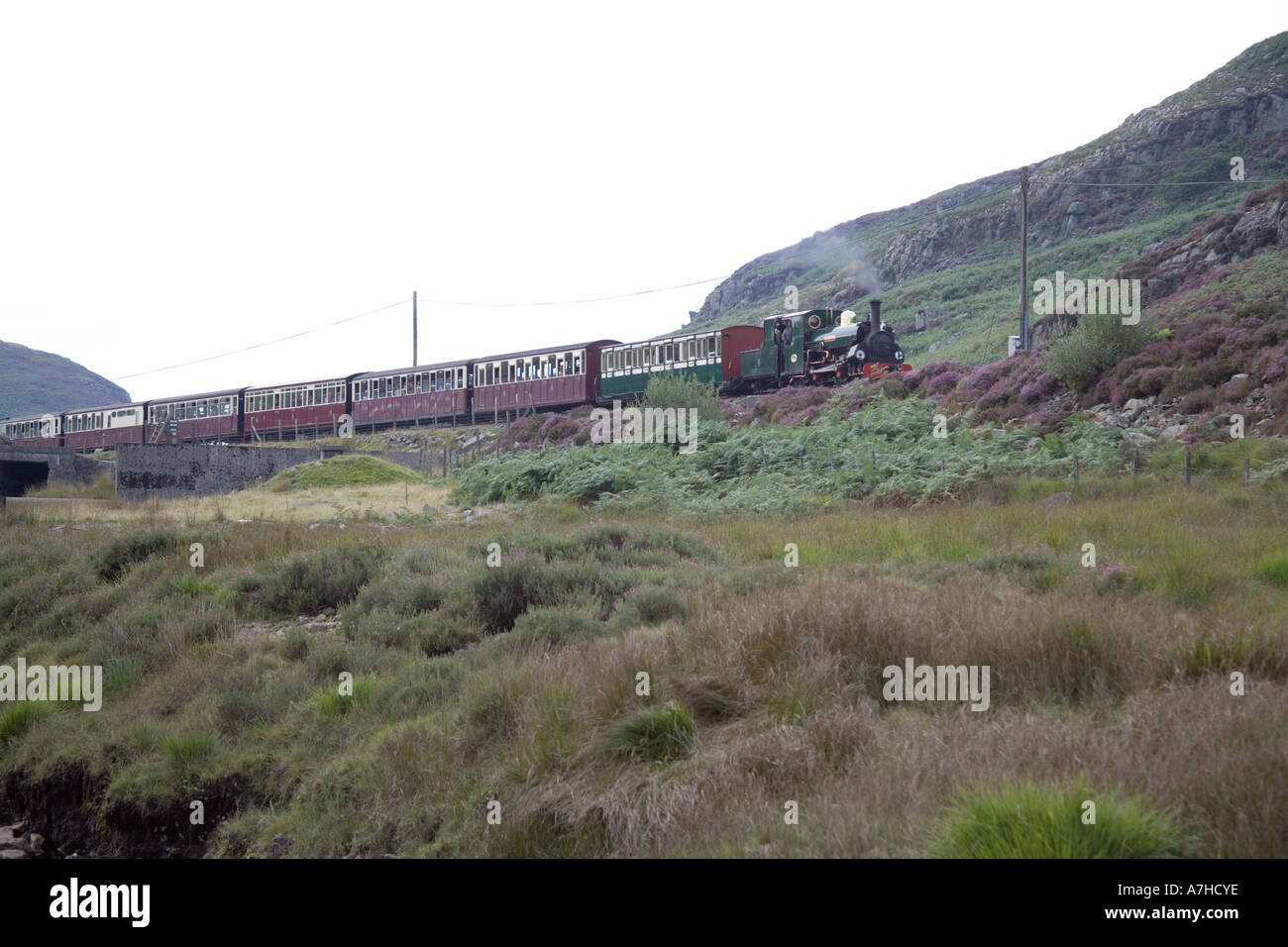 Steam train on the Ffestiniog railway above Tanygrisiau reservoir ,Blaenau Ffestiniog,North ...